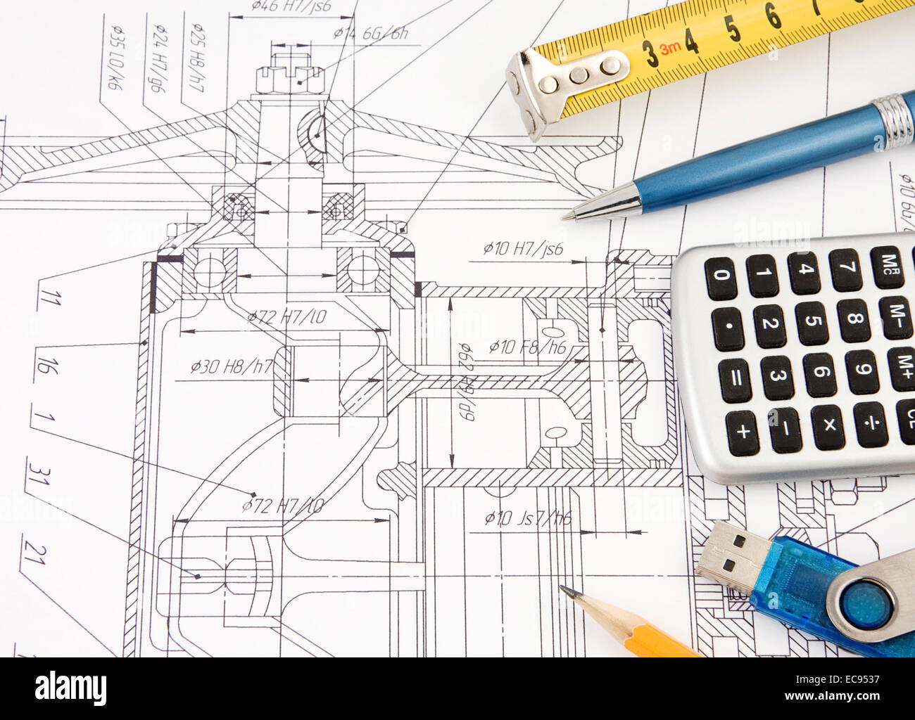 pen, flash memory and tape measure on drafting Stock Photo - Alamy