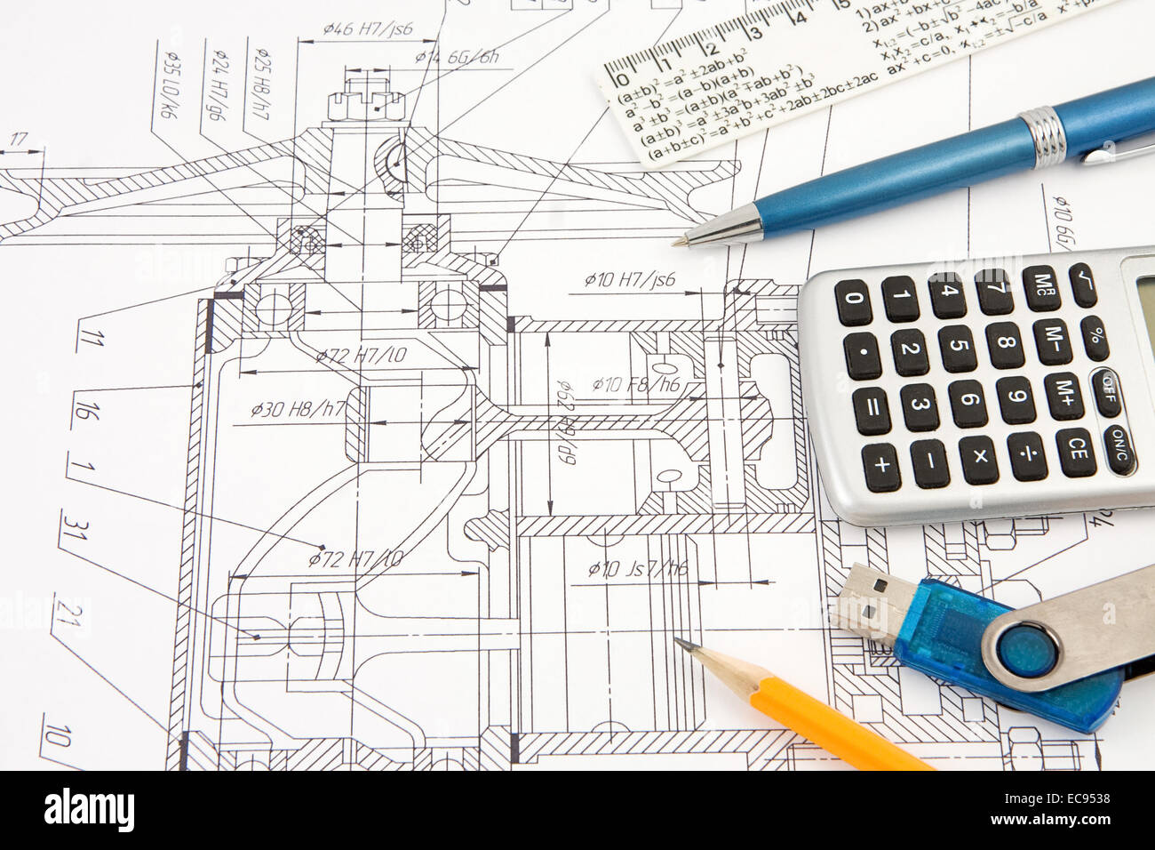 pen, pencil and memory flash stick on drafting Stock Photo - Alamy