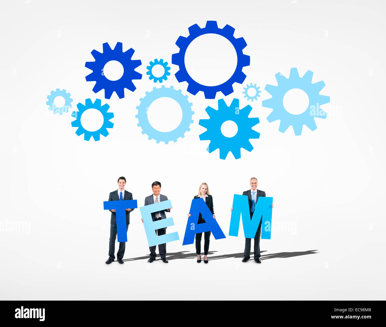 Business People Forming Team and Gears Above Stock Photo - Alamy