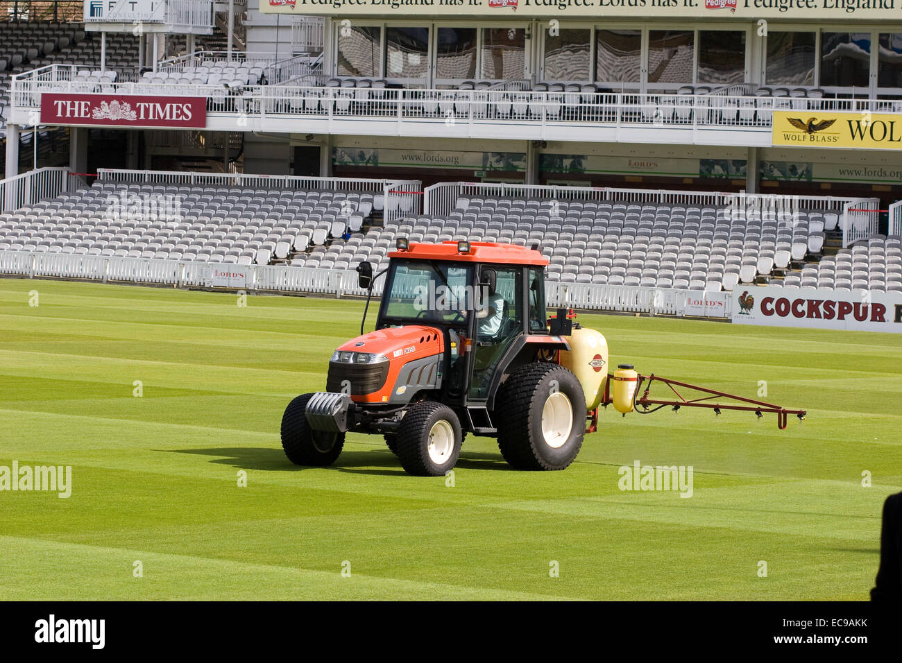Tractor preparing the cricket ground Stock Photo - Alamy