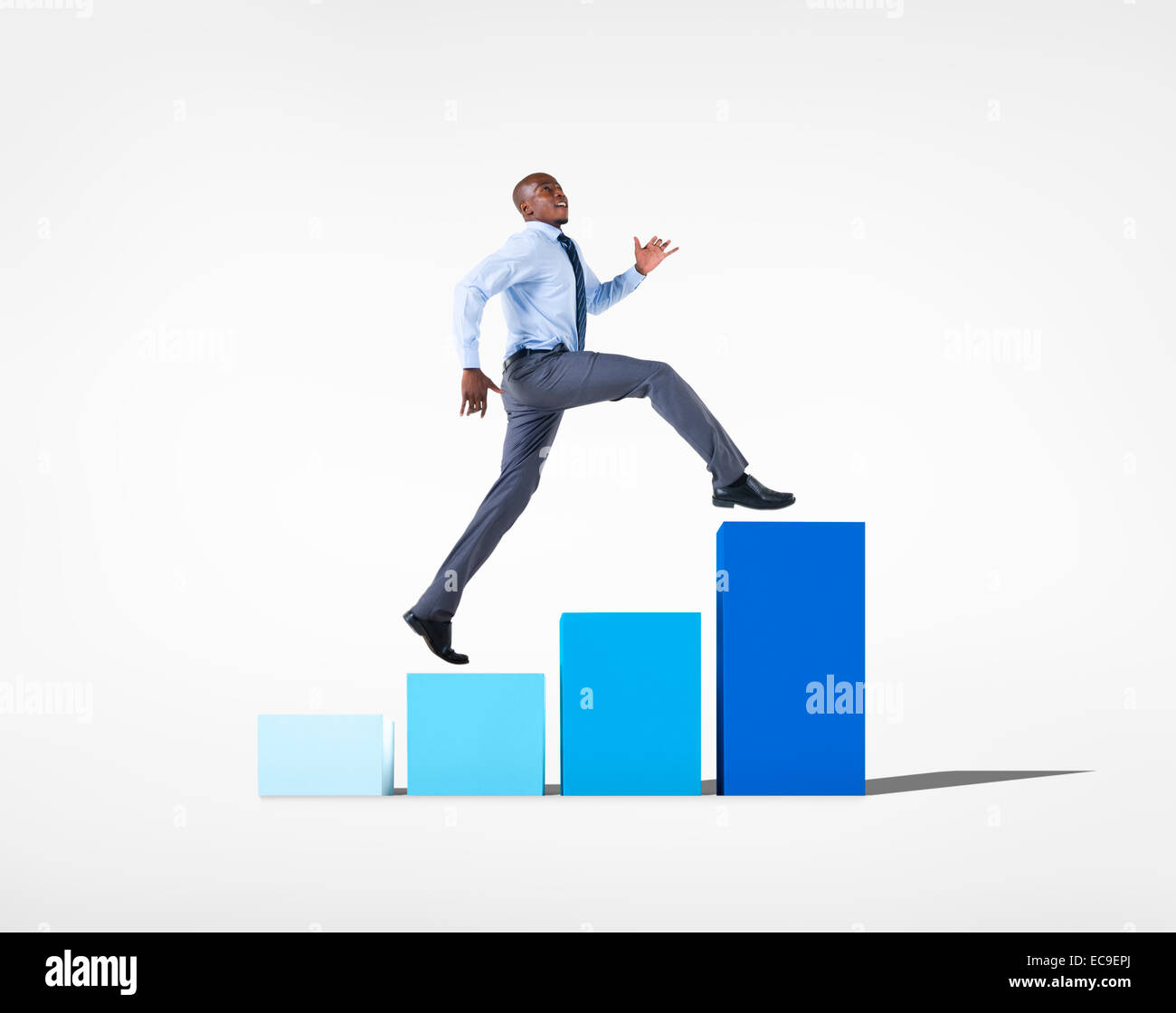Businessman jumping on a developing graph Stock Photo - Alamy