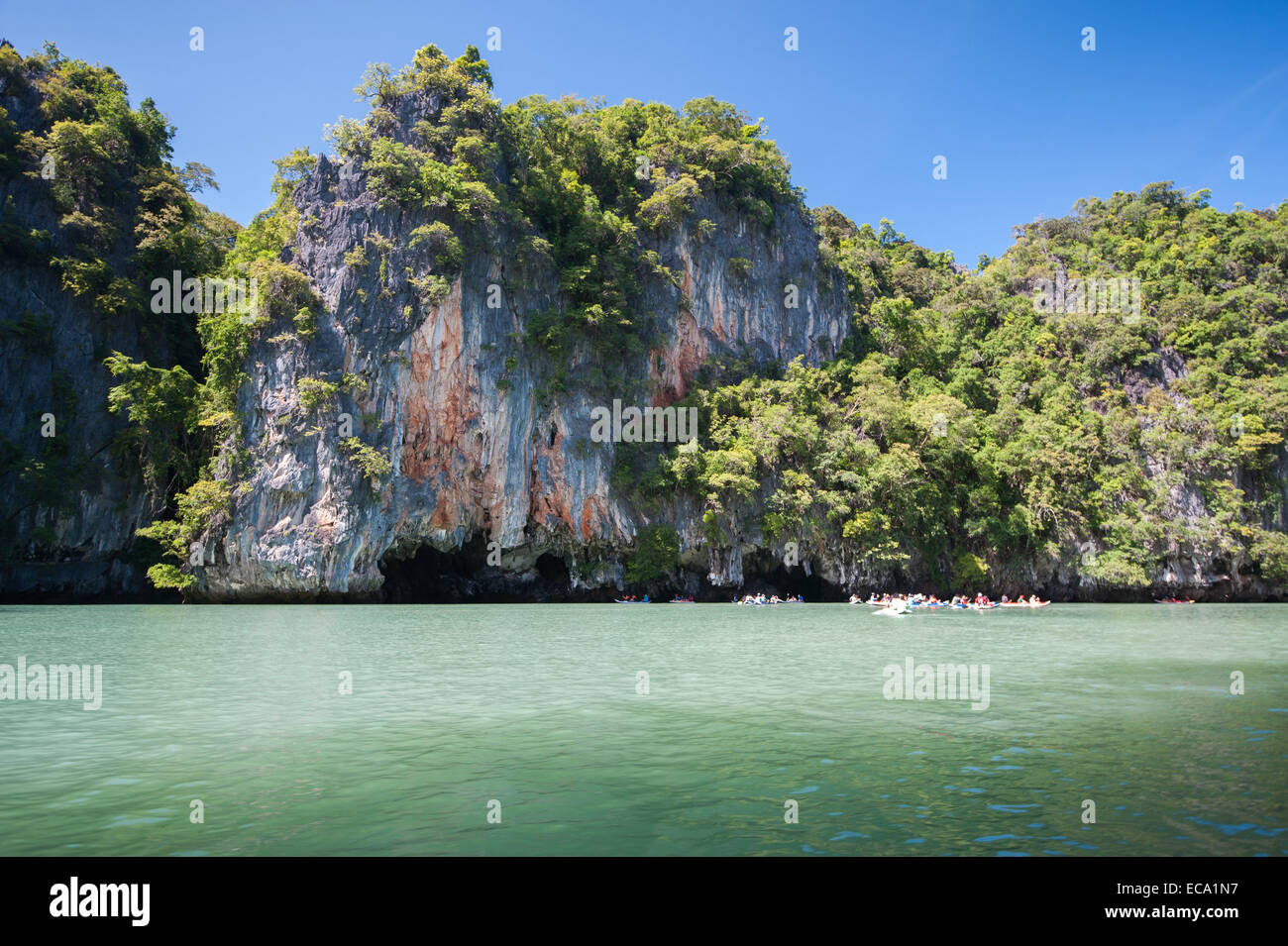 Jungle covered limestone cliffs at Phang Nga Bay Stock Photo - Alamy