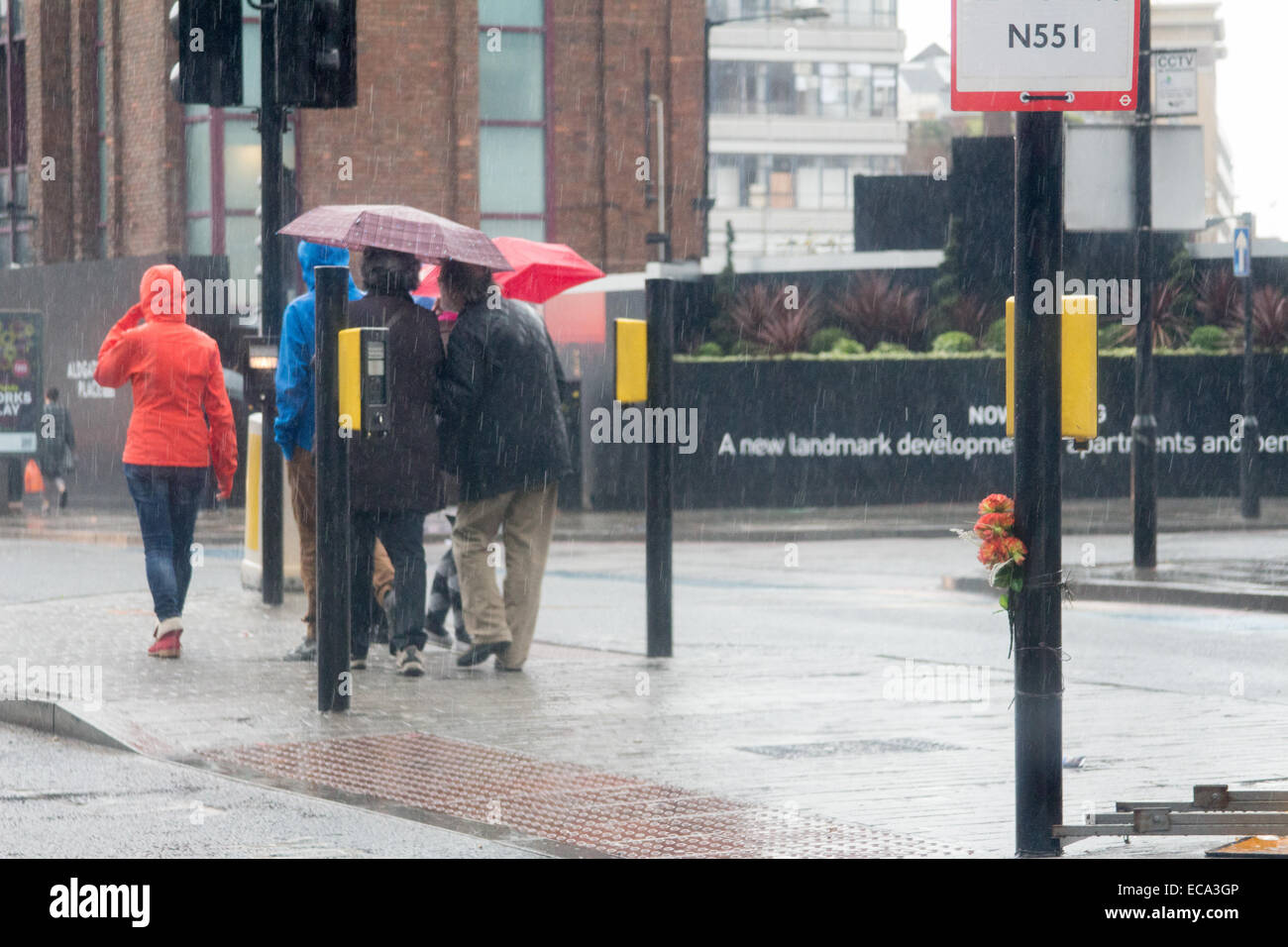 People walking in the rain with umbrellas Stock Photo - Alamy