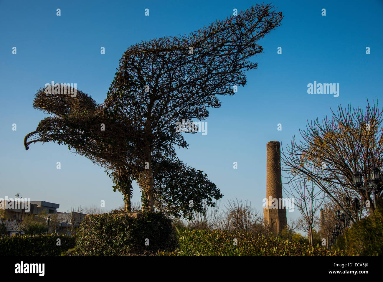 Eagle sculpture in front of Sheik Chooli minaret in Shanadar Park ...