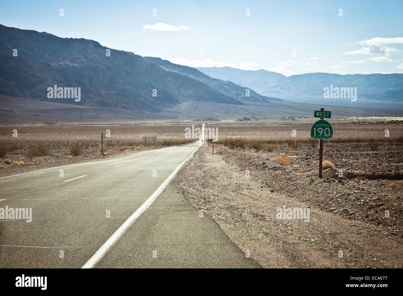 State Route crossing the desert landscape of Death Valley, California ...
