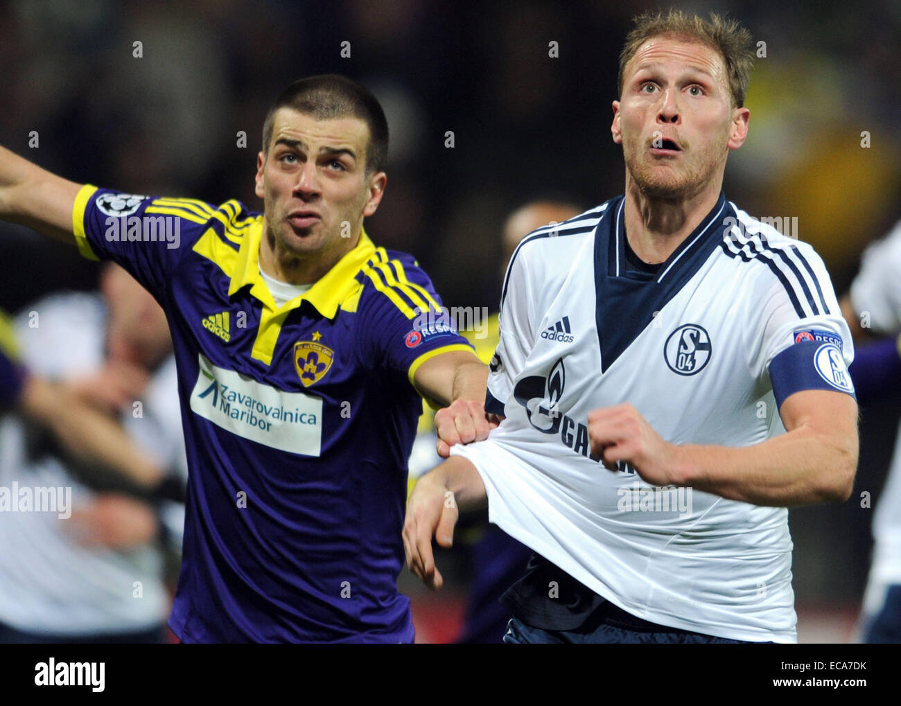 Schalke's Benedikt Hoewedes (R) and Maribor's Mitja Viler (L) vie for ...
