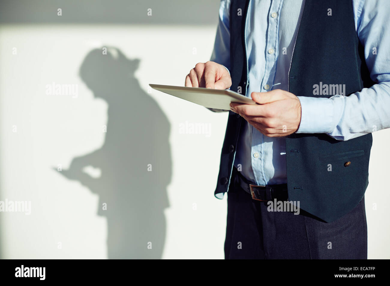 Male employee networking in isolation Stock Photo - Alamy