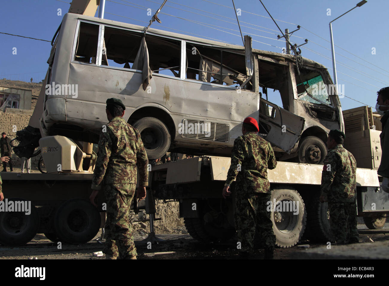 Kabul, Afghanistan. 11th Dec, 2014. Afghan security forces transfer a ...