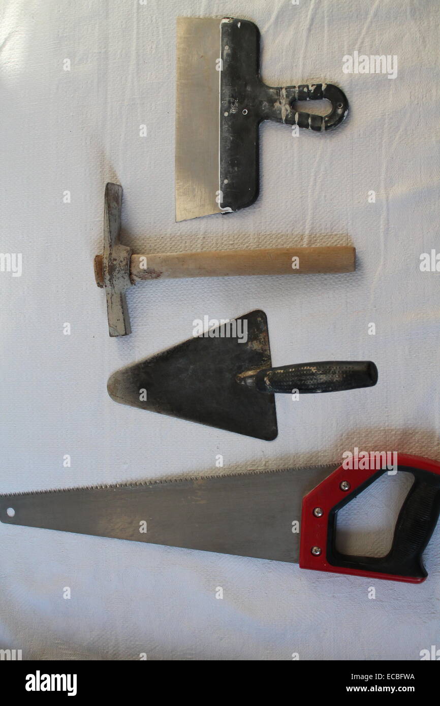 set of the building tools saw, hammer, spatula, masonry trowel clean ...
