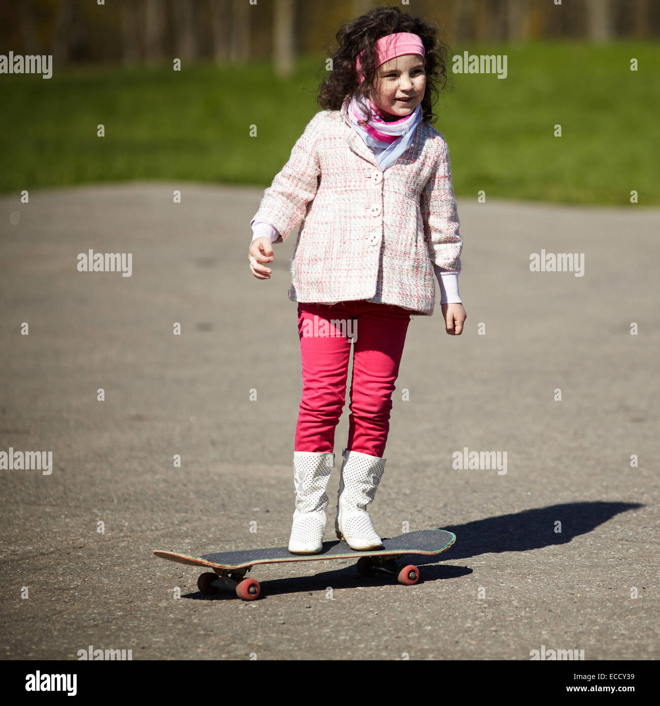 little girl skating on the street Stock Photo - Alamy
