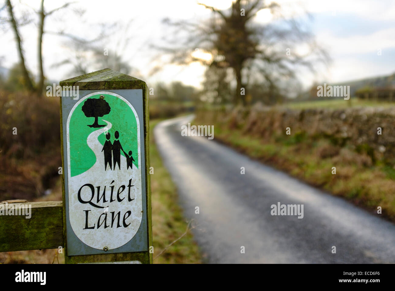A Quiet lane sign in a rural setting with a lane leading away from the ...