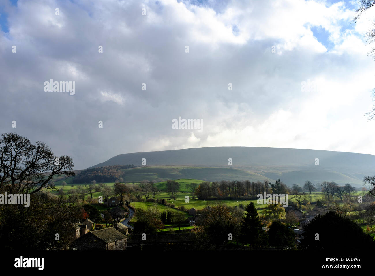 Pendle Hill in Lancashire UK as seen from the village on Downham ...