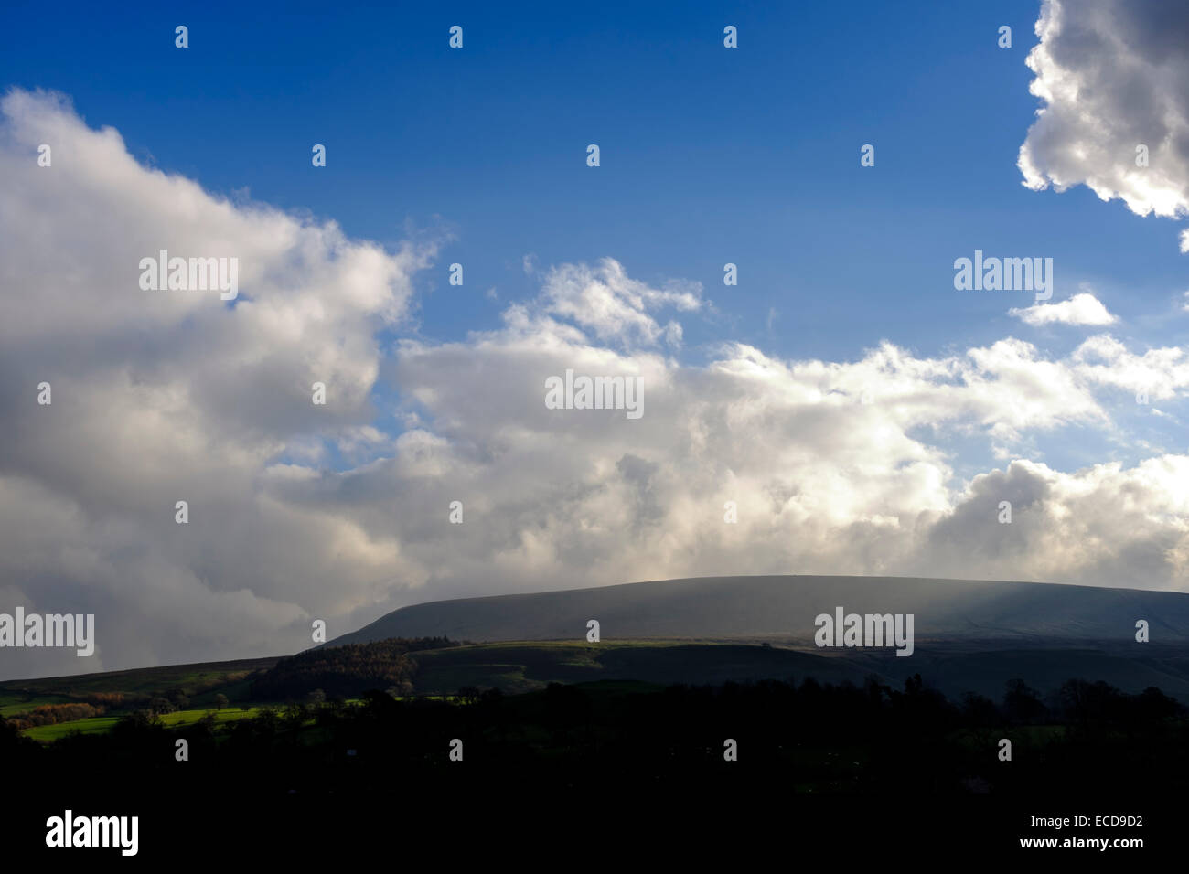 Pendle Hill in Lancashire UK as seen from the village on Downham ...