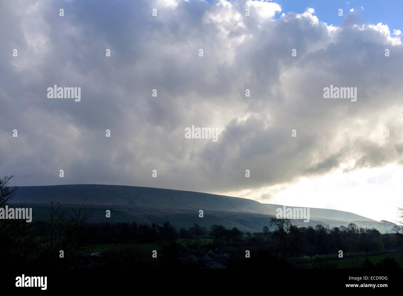 Pendle Hill in Lancashire UK as seen from the village on Downham ...