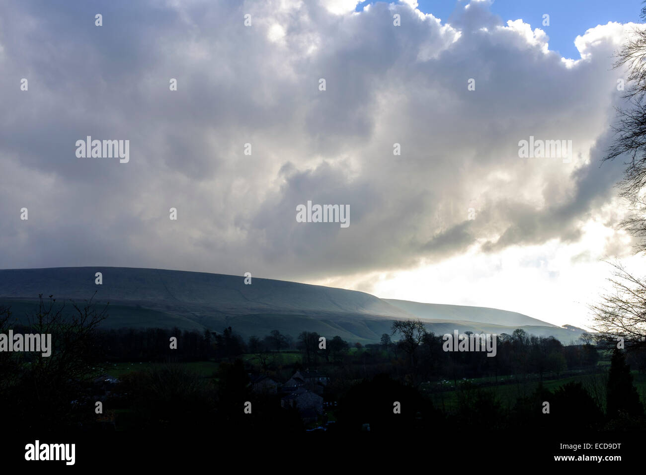 Pendle Hill in Lancashire UK as seen from the village on Downham ...
