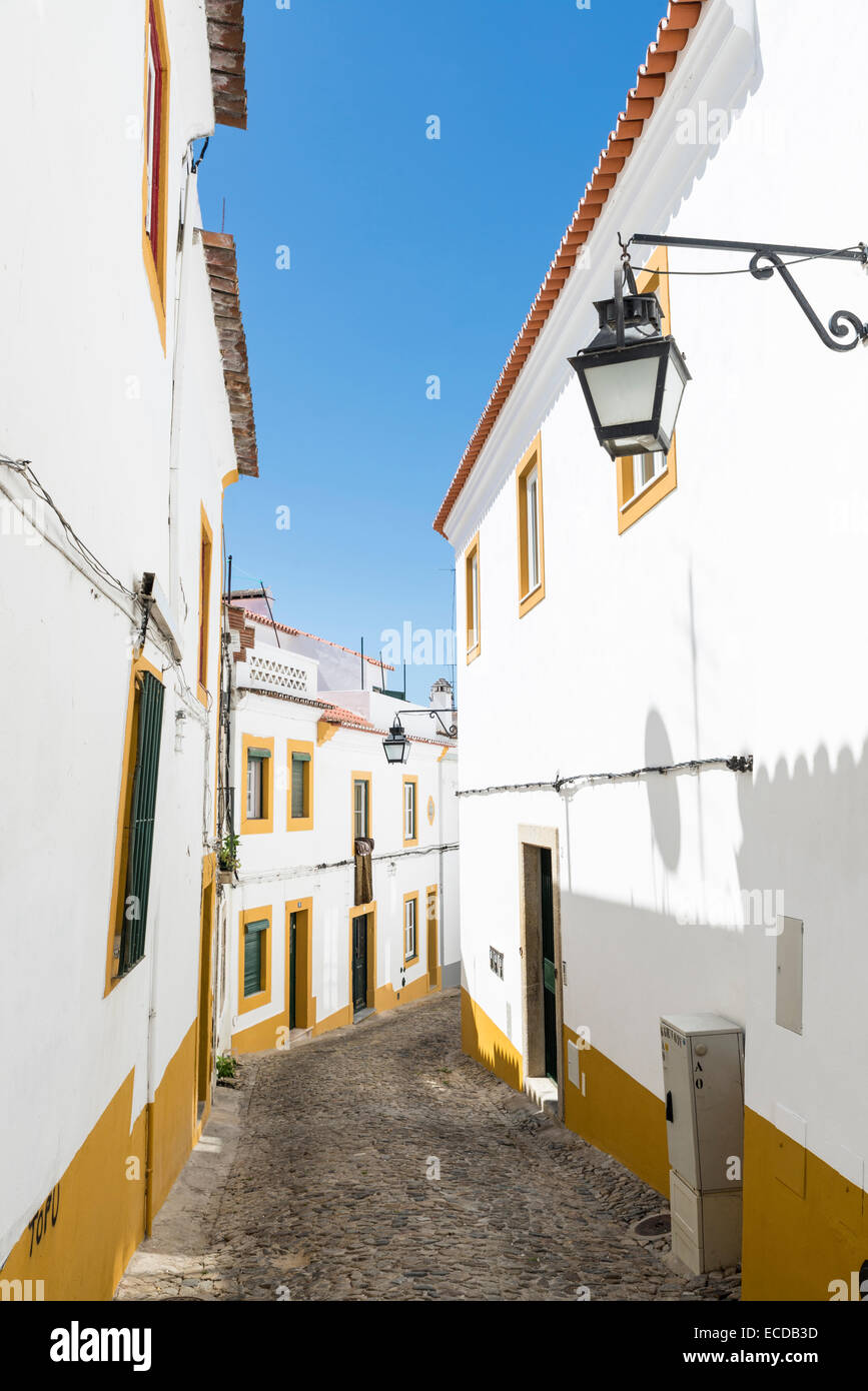 Street in Evora, Portugal. Since 1996, Evora is declared World Heritage ...