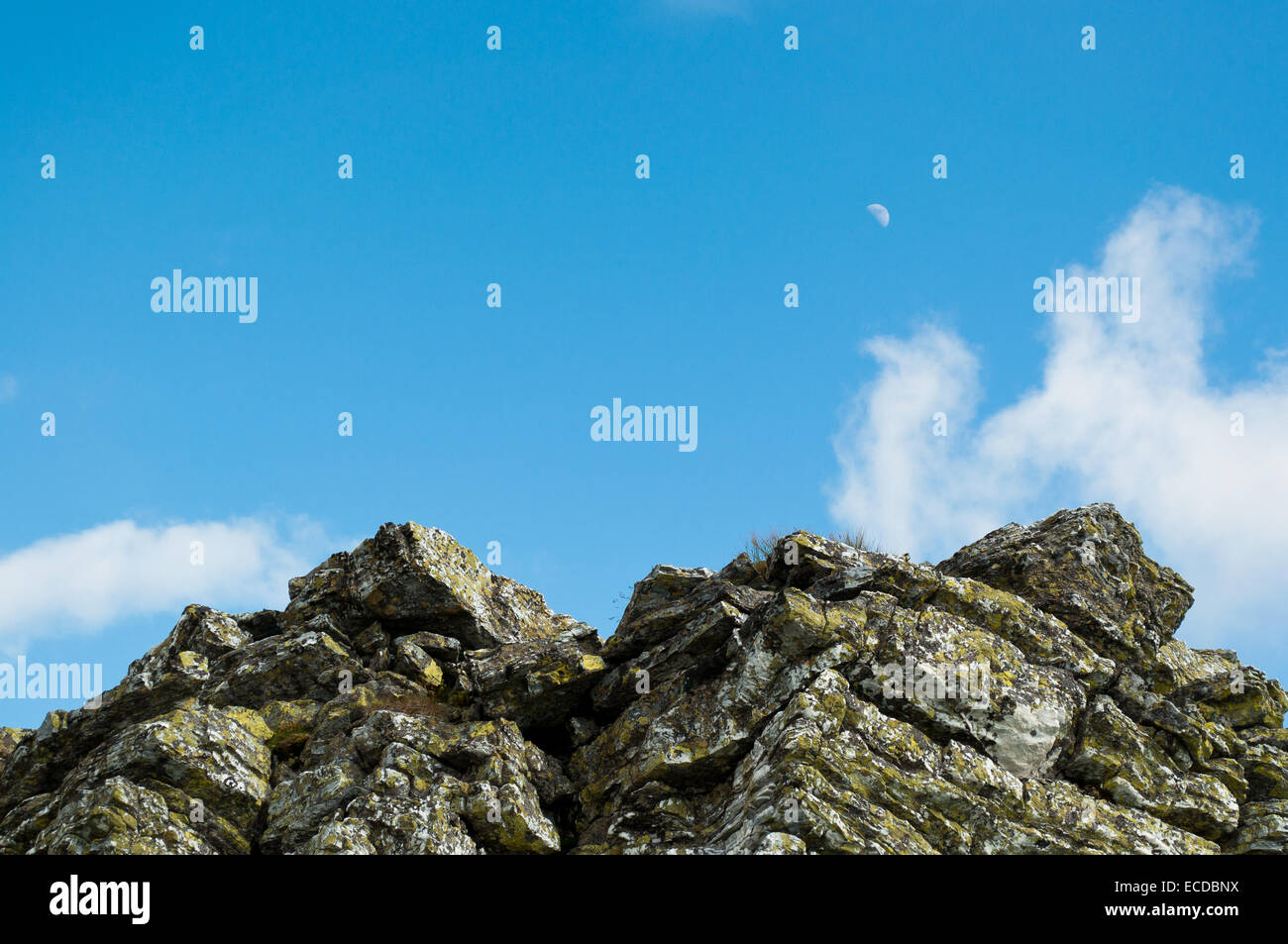 Rocks, sky and moon background Stock Photo - Alamy