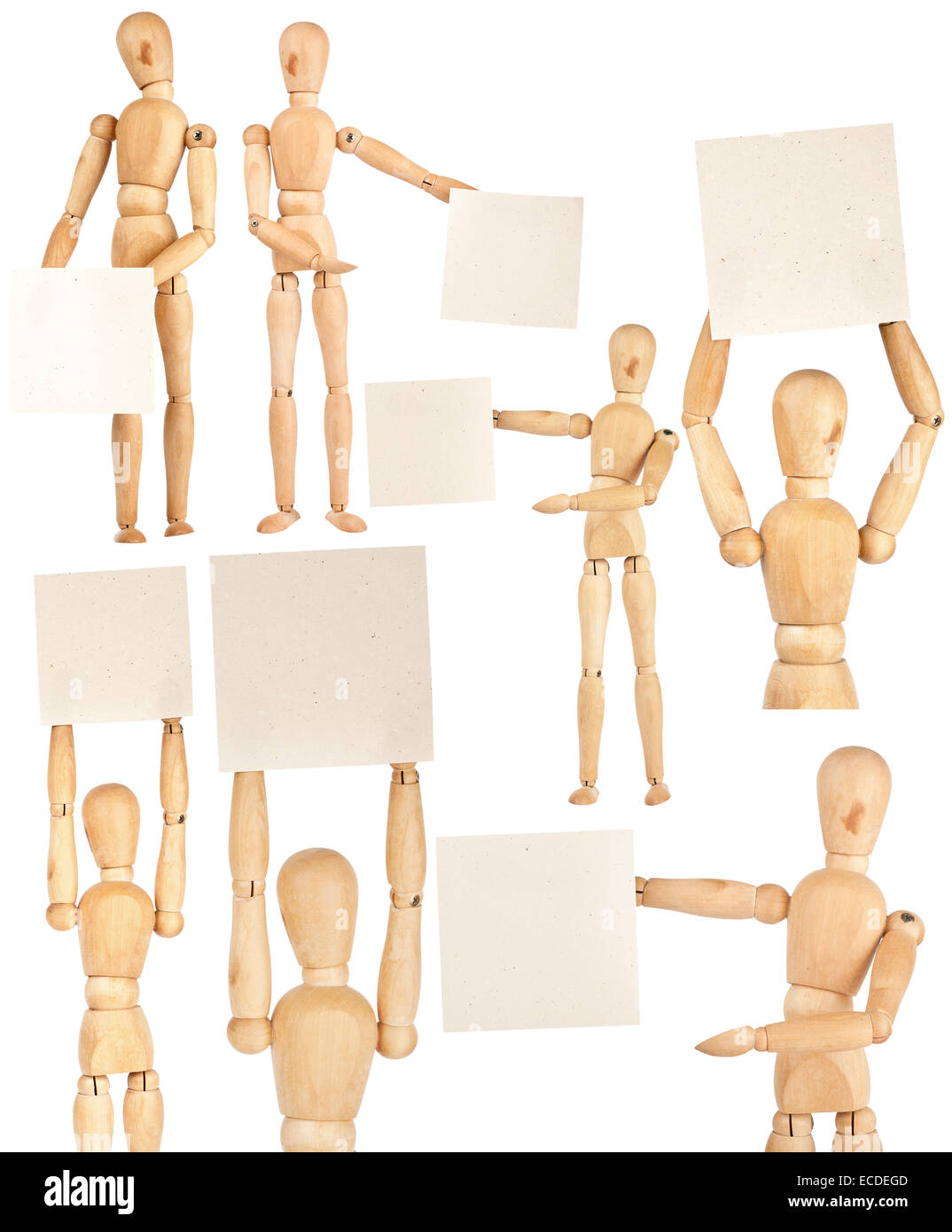 Set of wooden dummies holding handmade paper isolated on a white ...