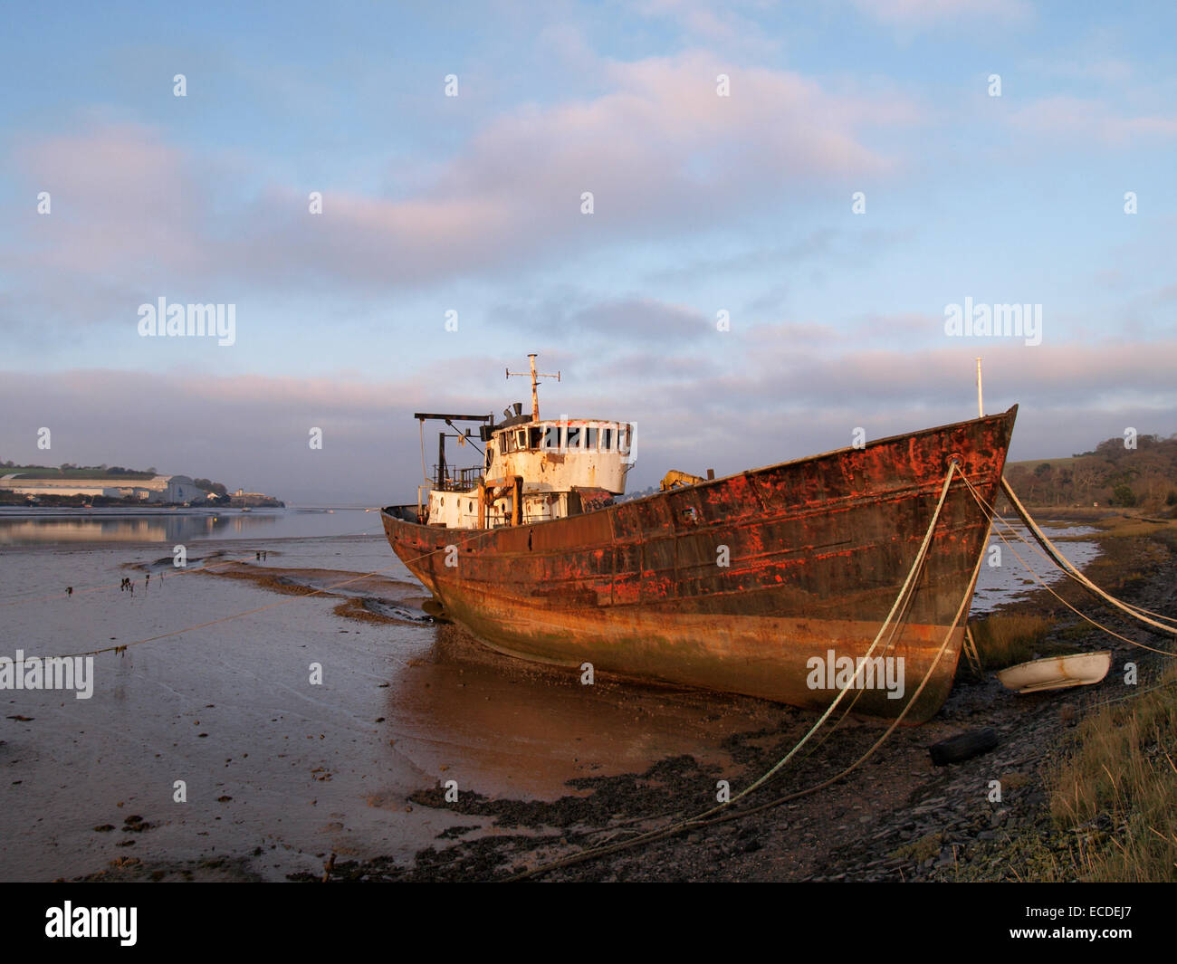 Old rusty ship beached on the edge of the Torridge Estuary at low tide ...