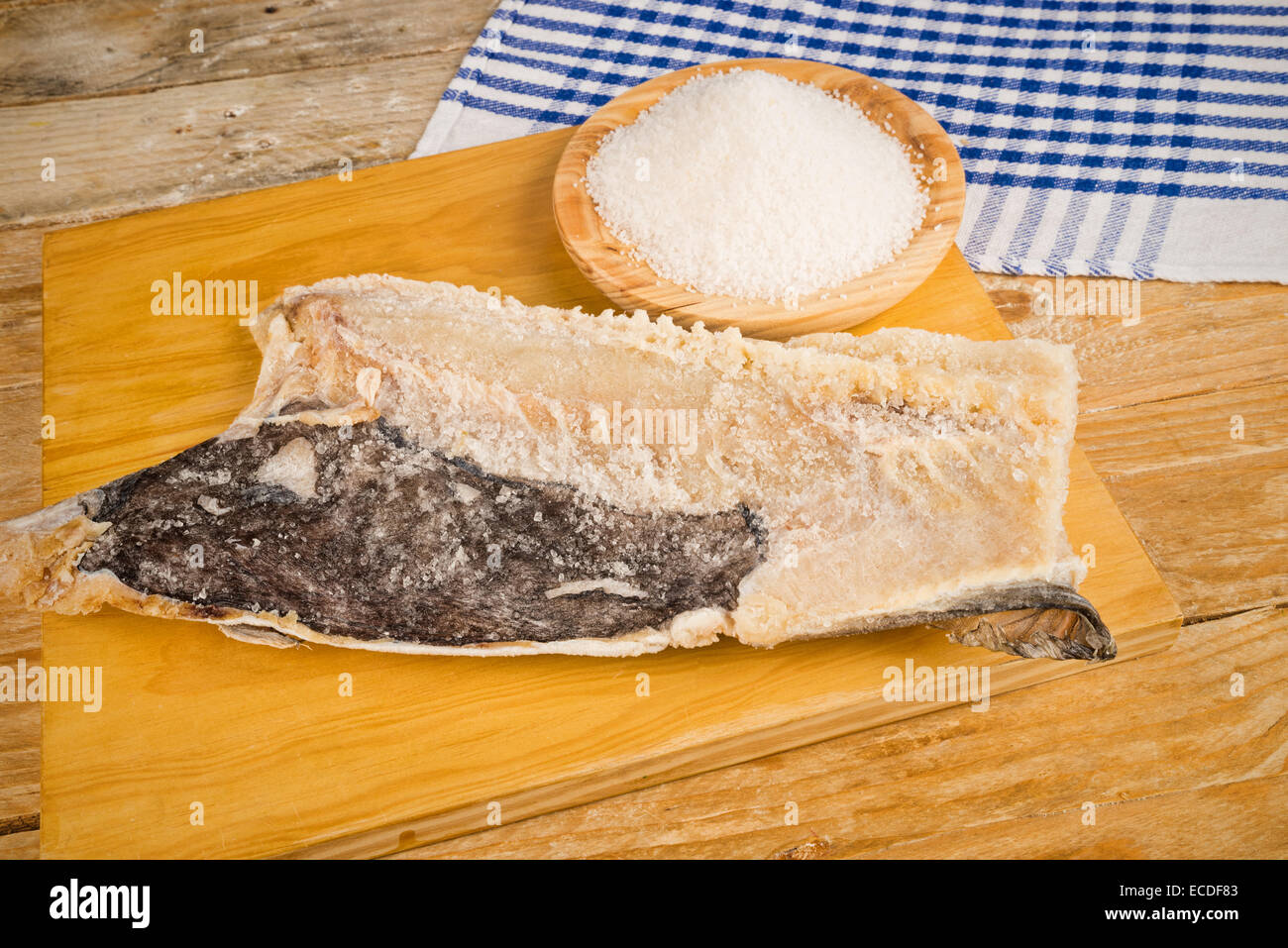 Salt preserved cod fish with its main ingredient Stock Photo - Alamy
