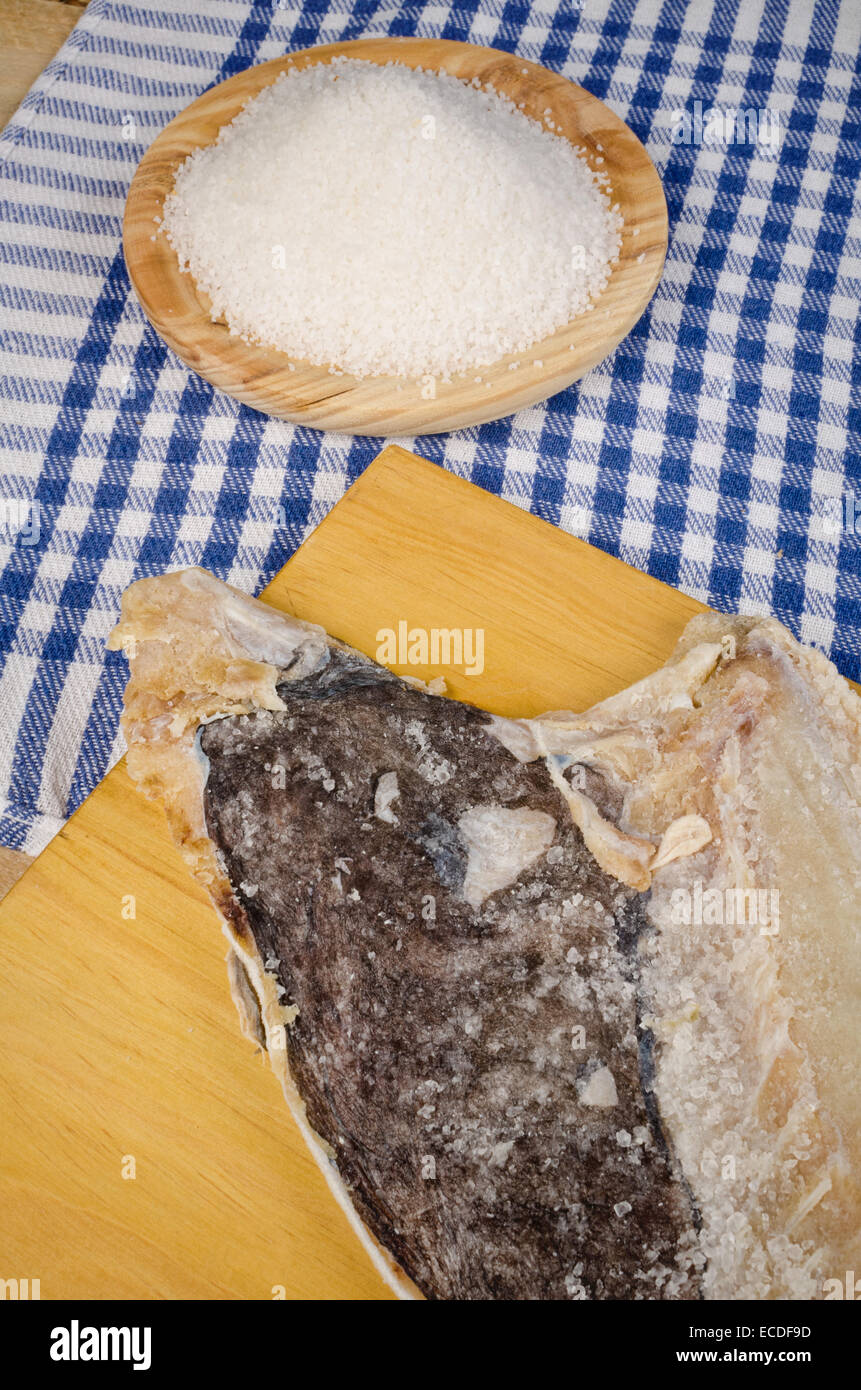 Salt preserved cod fish with its main ingredient Stock Photo - Alamy