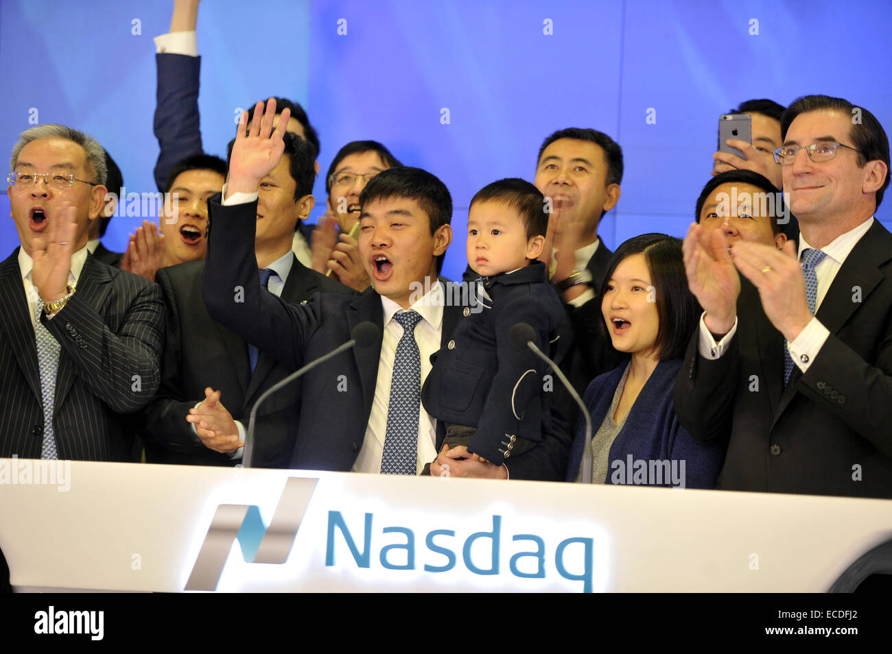 New York, USA. 11th Dec, 2014. Yan Tang (C, front), founder and chief ...