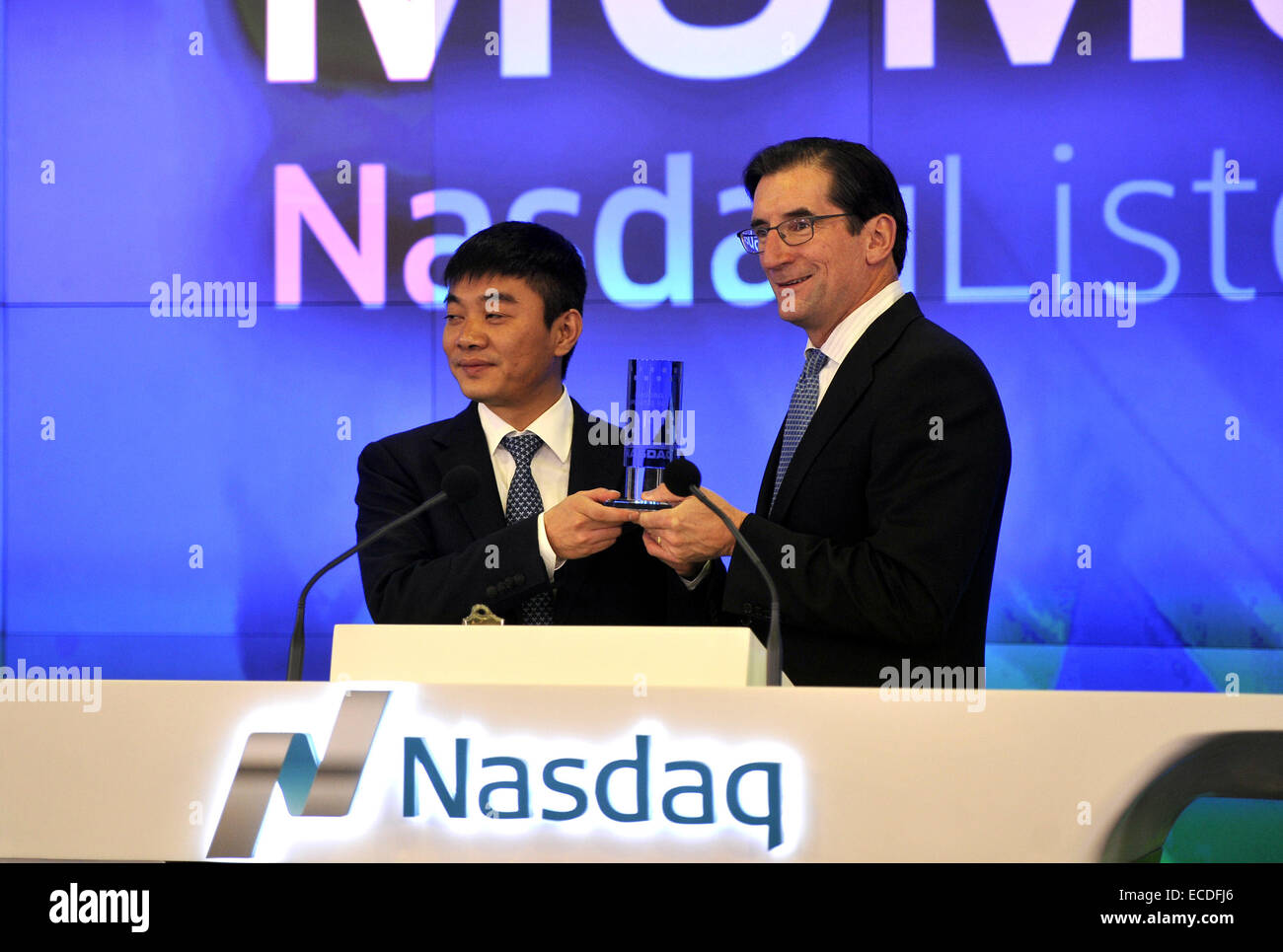 New York, USA. 11th Dec, 2014. Yan Tang (C, front), founder and chief ...