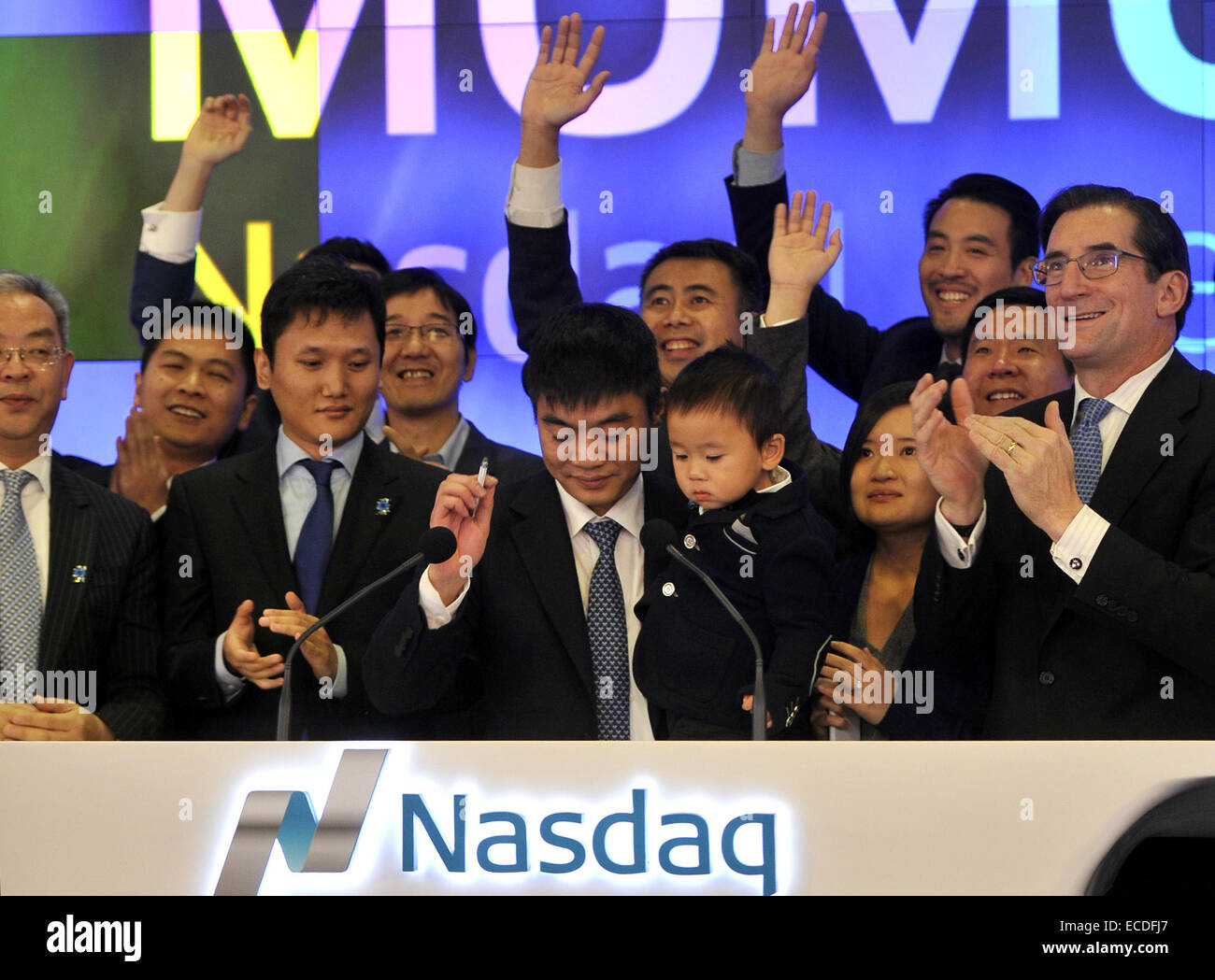 New York, USA. 11th Dec, 2014. Yan Tang (C, front), founder and chief ...
