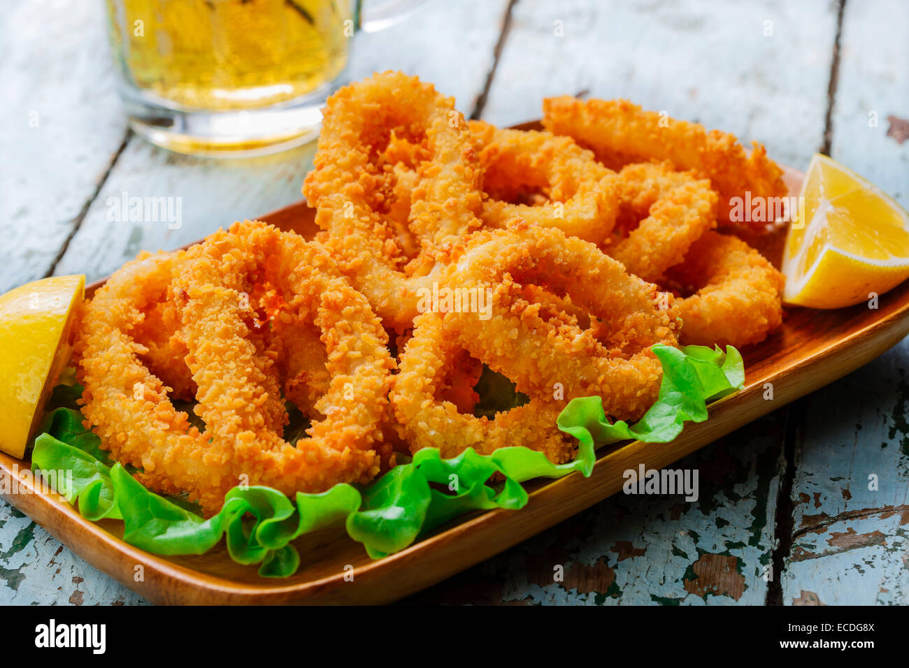 fried squid rings breaded with lemon Stock Photo - Alamy