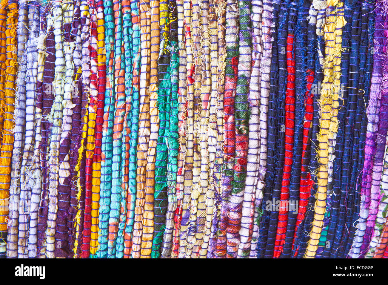 Part of a colorful rug made from recycled textiles Stock Photo - Alamy