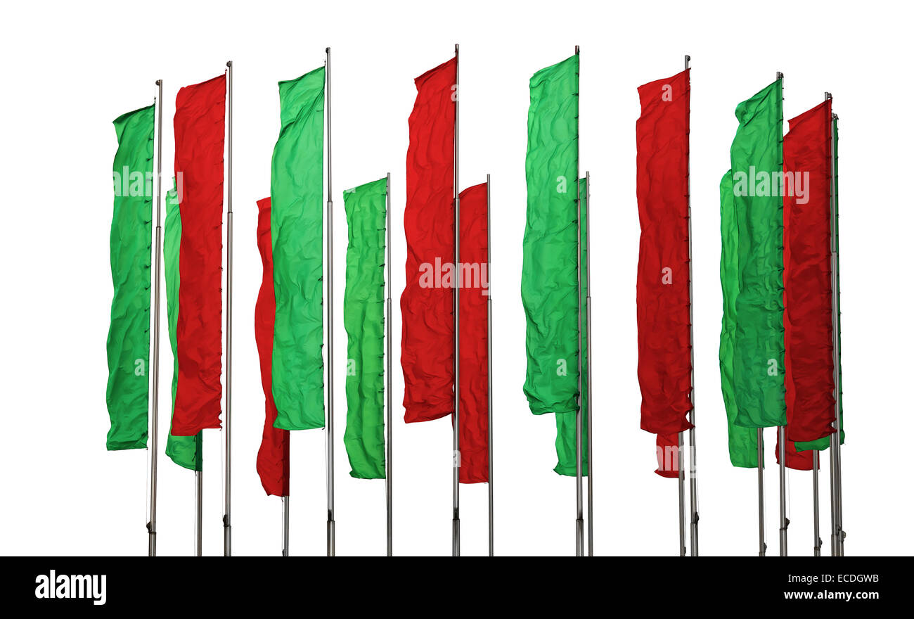 Several flagpoles with vertical green and red flags Stock Photo - Alamy