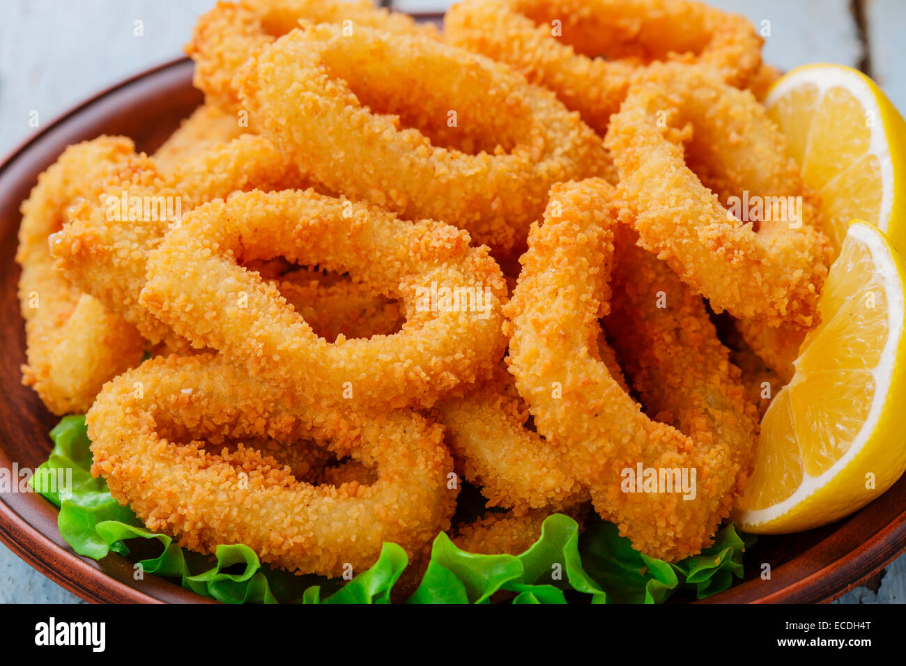 fried squid rings breaded with lemon Stock Photo - Alamy