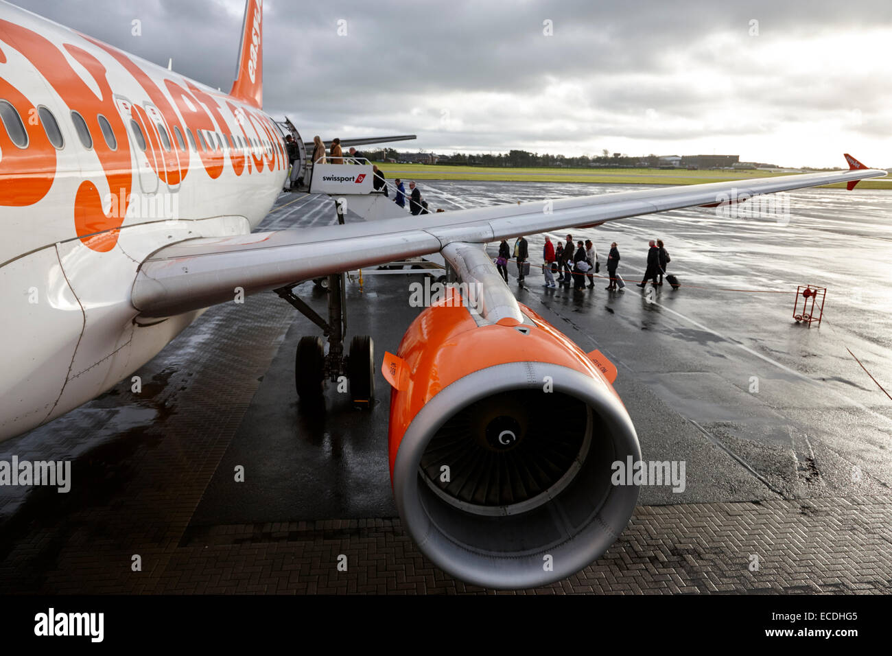 passengers boarding easyjet airbus aircraft at belfast international ...