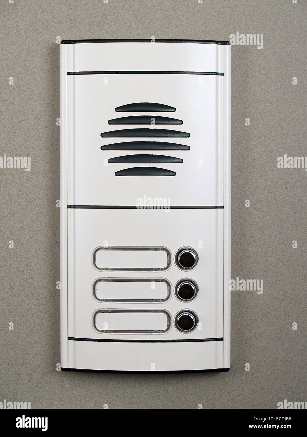 Entrance door intercom on gray background Stock Photo - Alamy