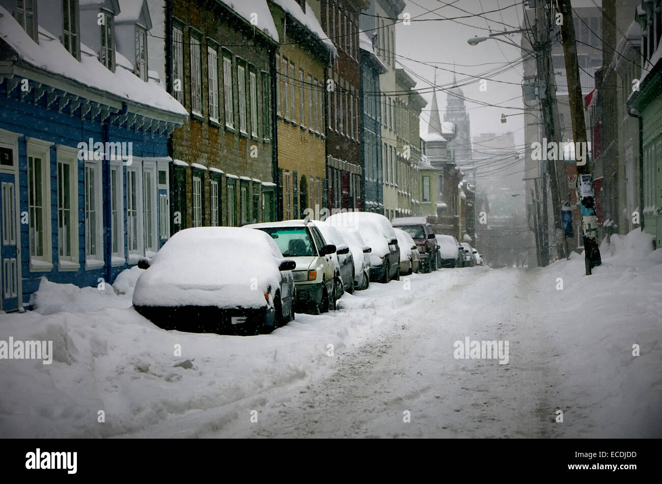 A Quebec city street buried in snow after a storm Stock Photo - Alamy