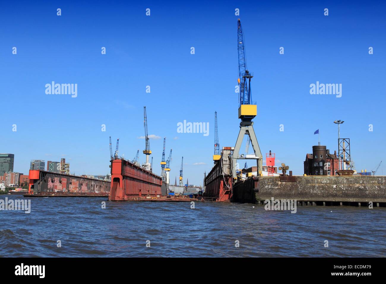 Hamburg, Germany - famous port seen from river Elbe. Industrial harbor ...