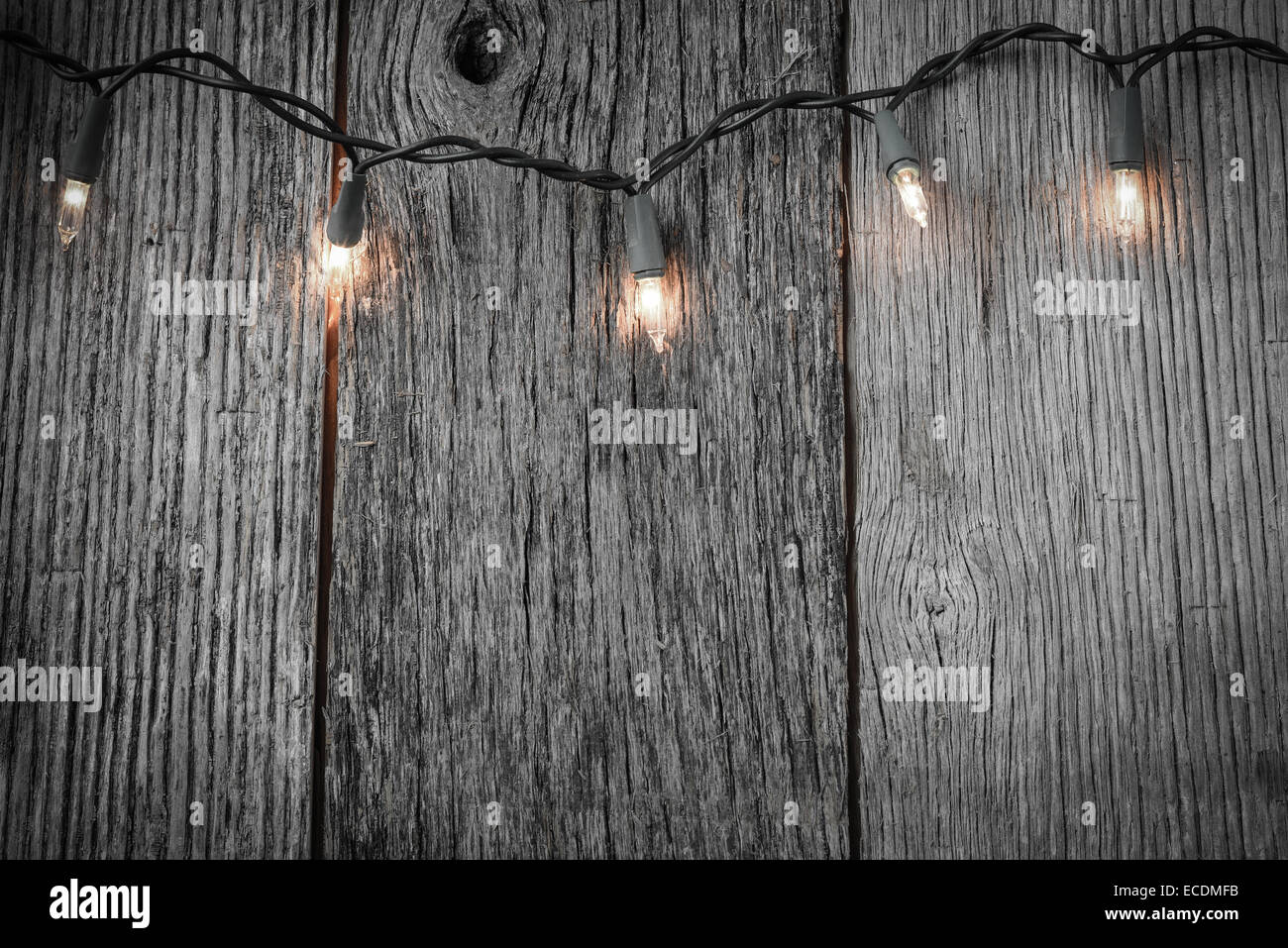 White Christmas Tree Lights with Rustic Wood Background Stock Photo - Alamy