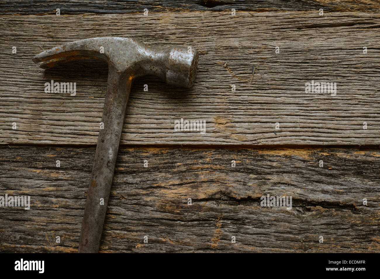 hammer on rustic hardwood floor Stock Photo - Alamy