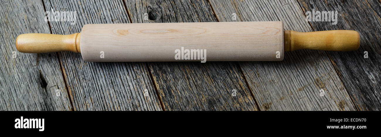 Rolling Pin on Rustic Wood Background Stock Photo - Alamy