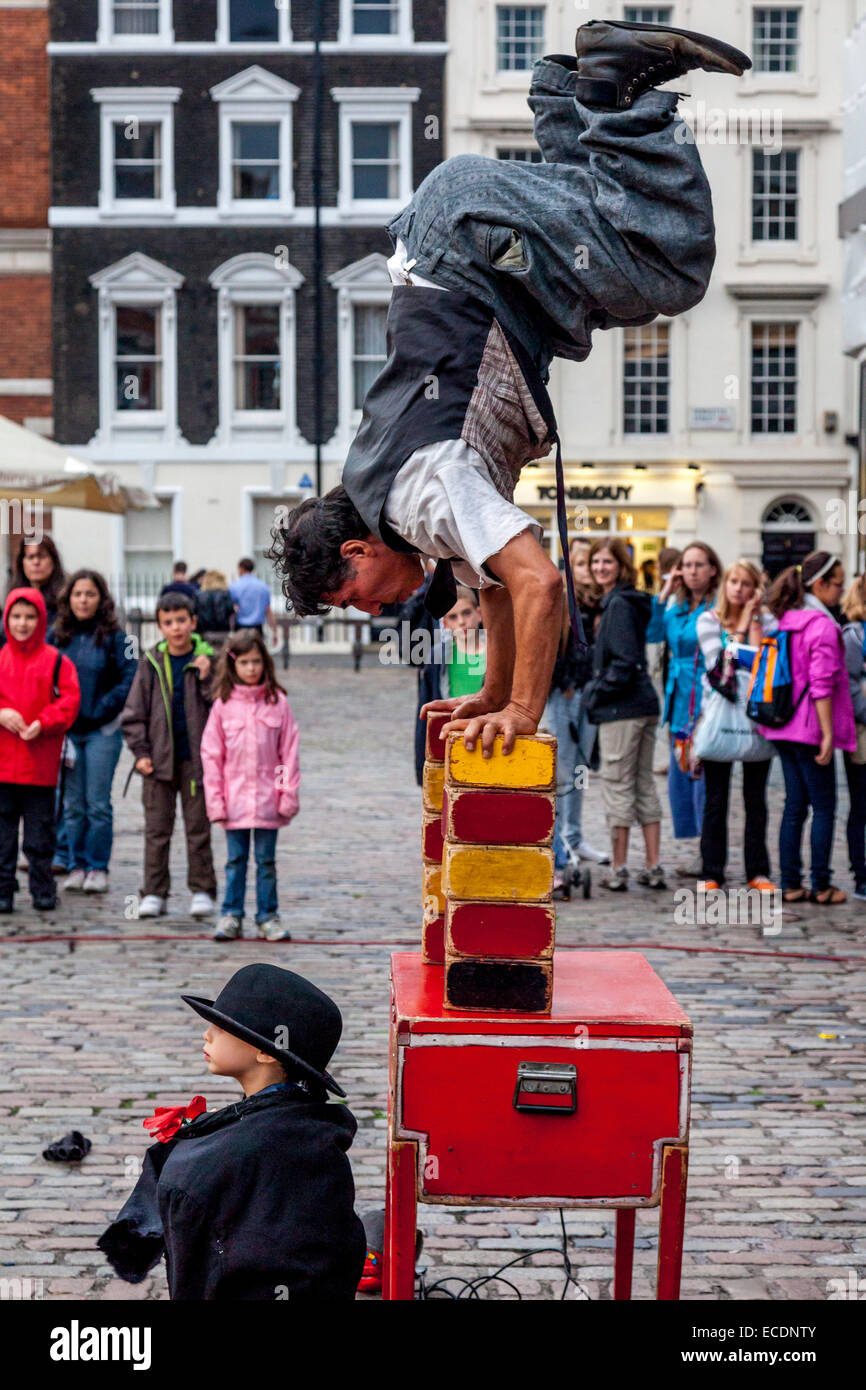 A Street Entertainer Performs In Covent Garden, London, England Stock ...