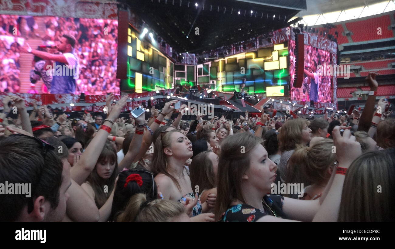 One Direction perform live in concert at Wembley Stadium Where: London ...