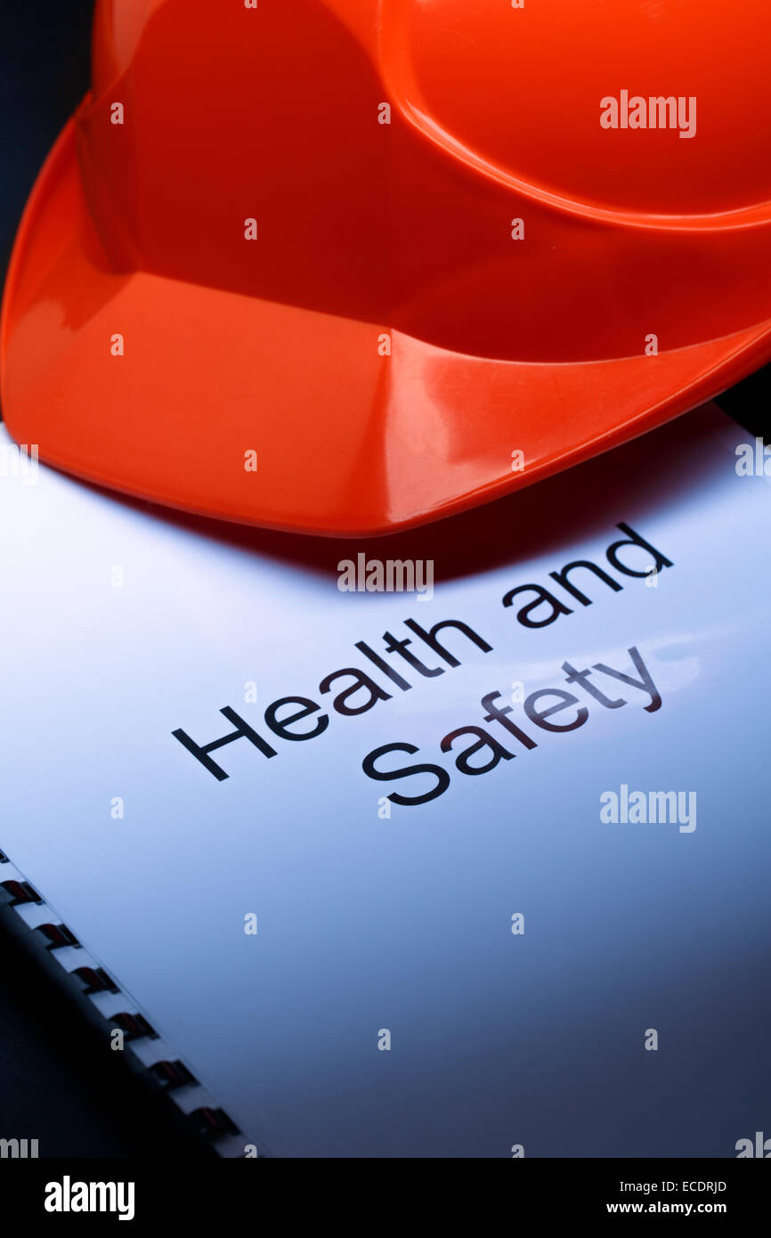 Health and safety register with helmet Stock Photo - Alamy