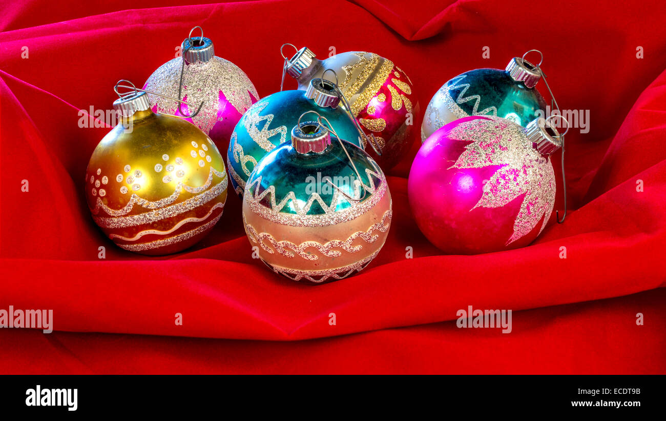 Antique Christmas balls on a red cloth Stock Photo - Alamy