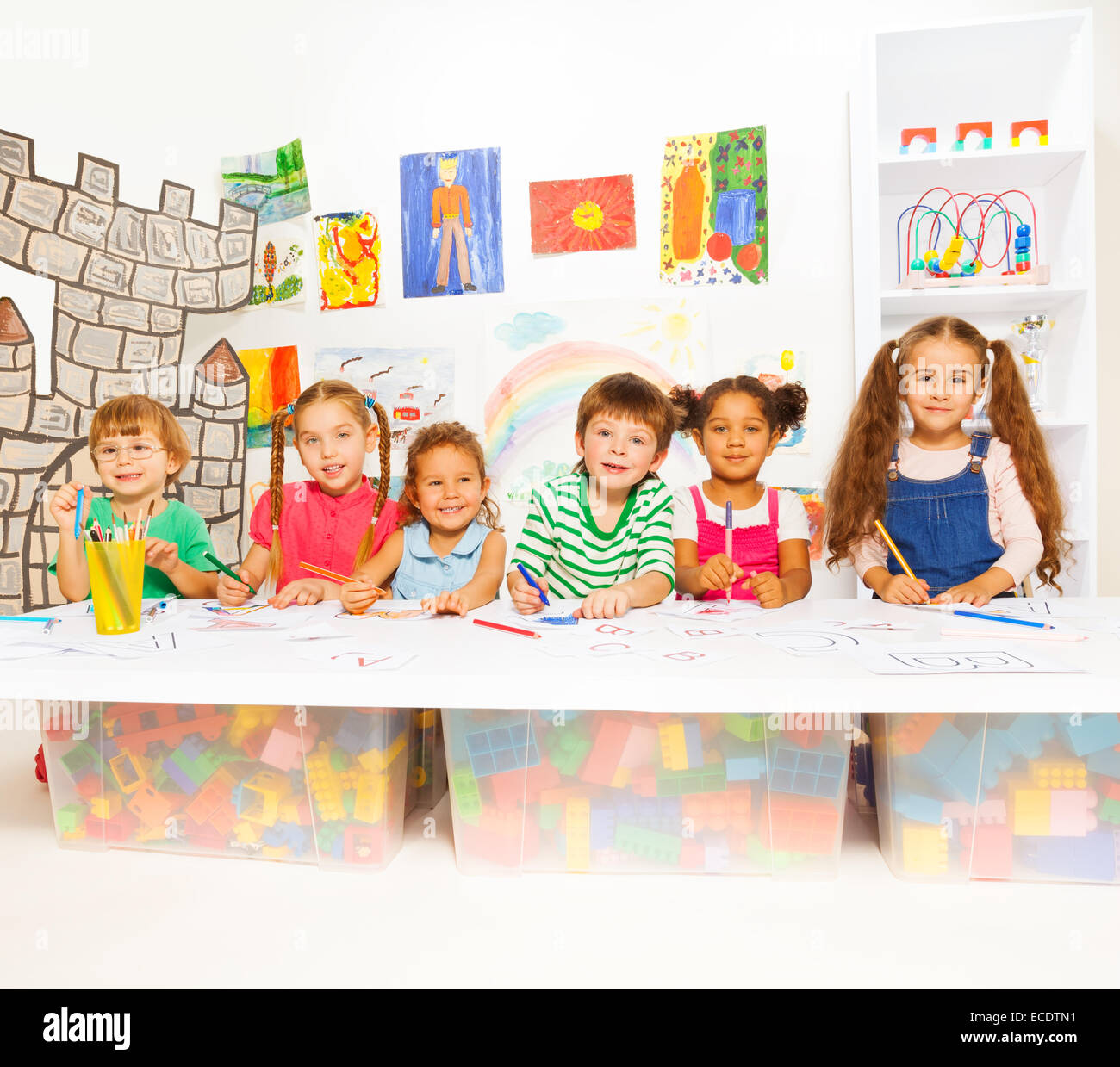 Smart little kids learning letters and reading Stock Photo - Alamy