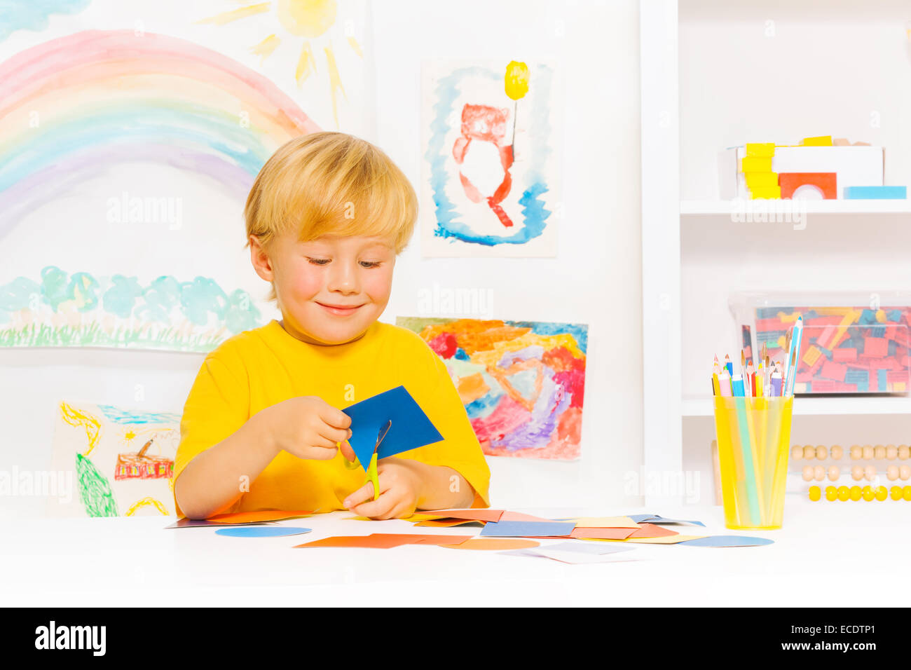 Boy cutting drawing scissors hi-res stock photography and images - Alamy