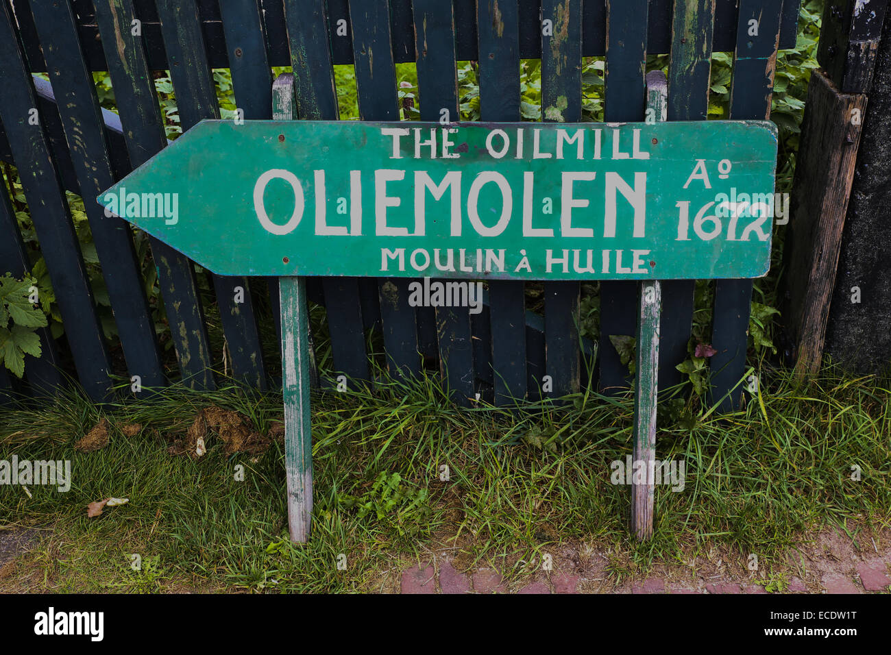 Dutch oil mill sign 1672 Stock Photo - Alamy