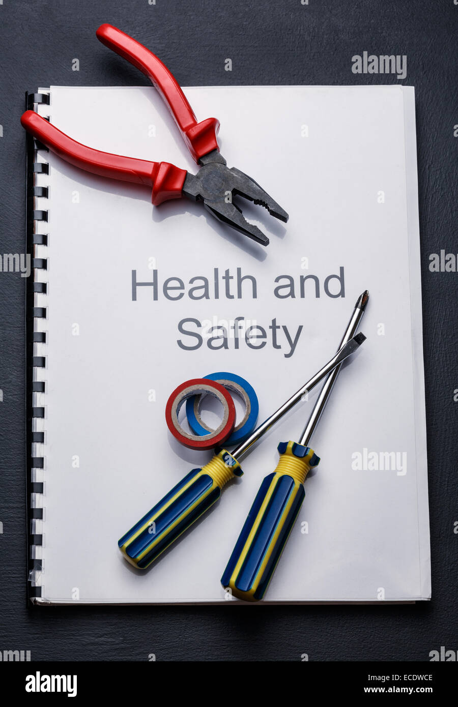 Health and safety with pliers and screwdrivers Stock Photo - Alamy