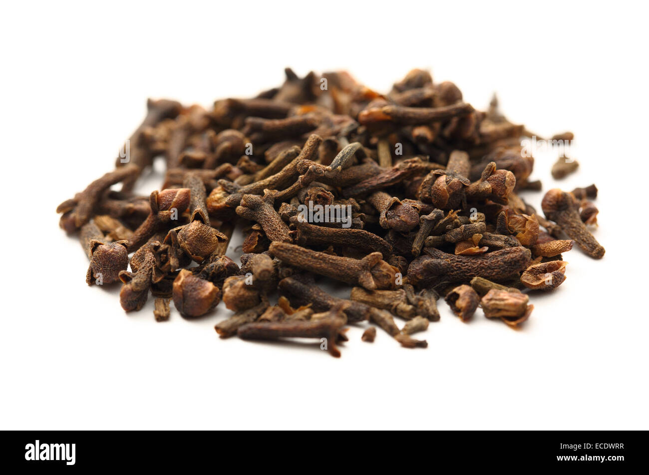 Cloves seeds on white background Stock Photo - Alamy