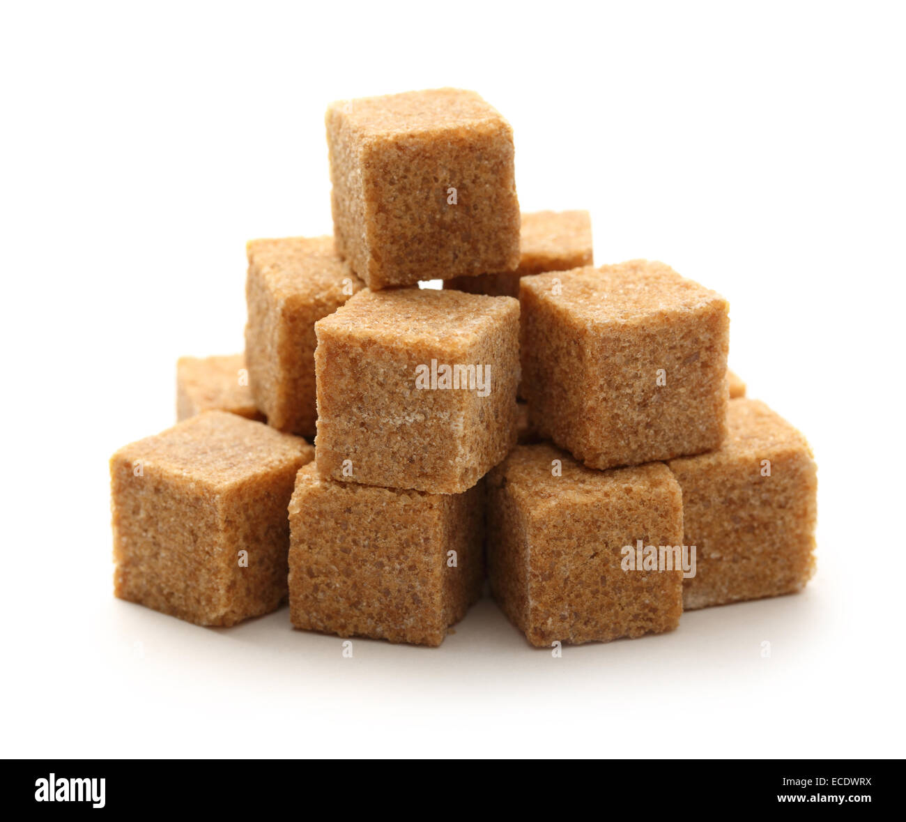 Cane sugar cubes on white background Stock Photo - Alamy
