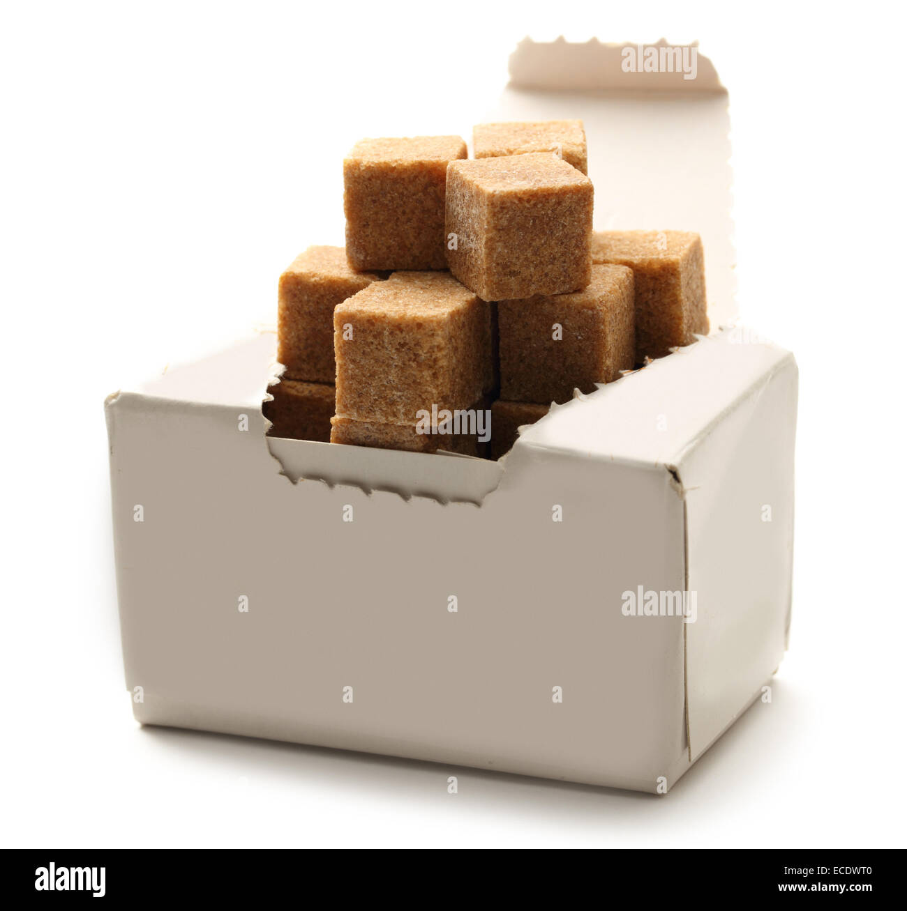 Cane sugar cubes on white background Stock Photo - Alamy